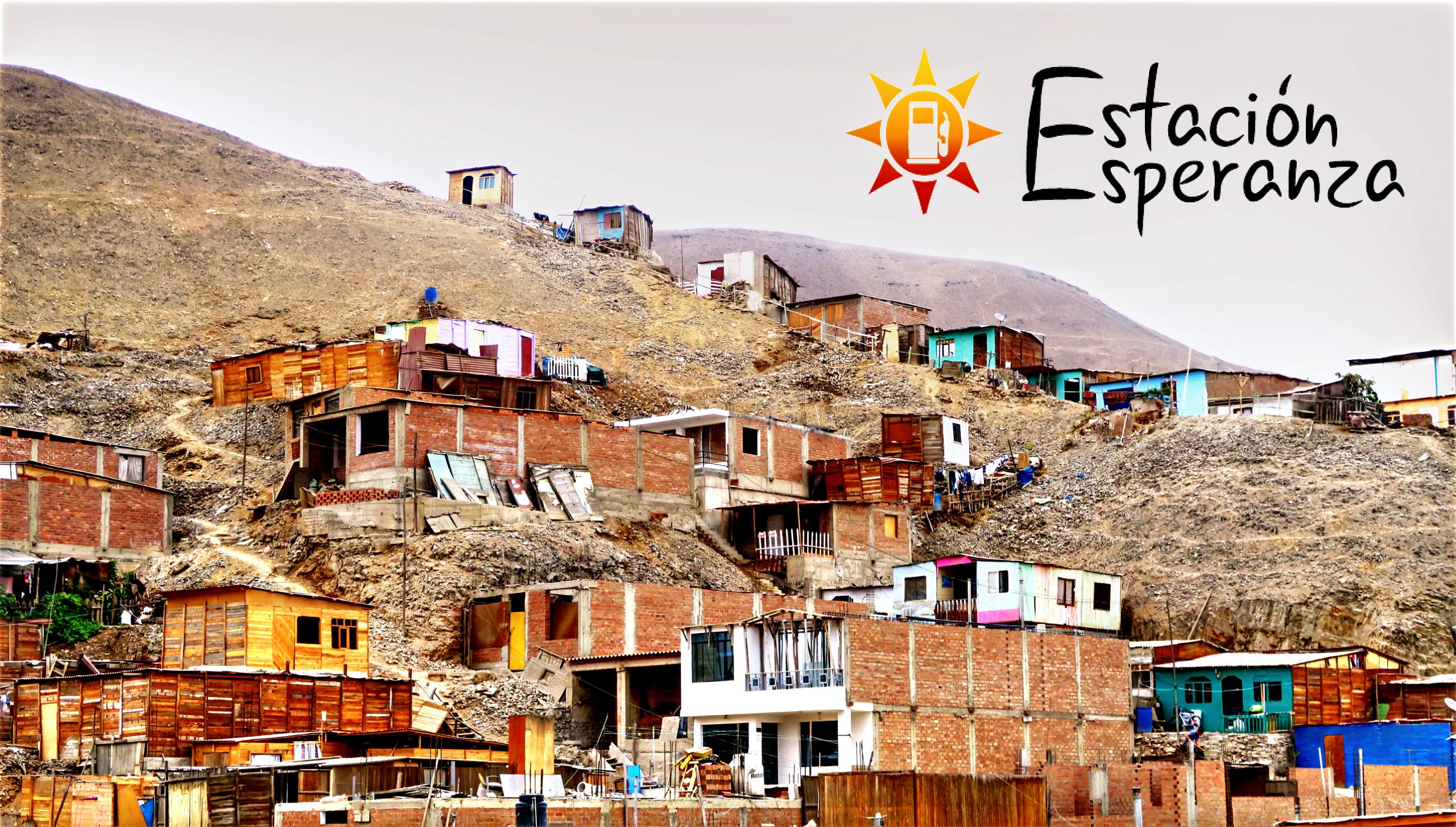 Slums mit Banner – Estacion Esperanza